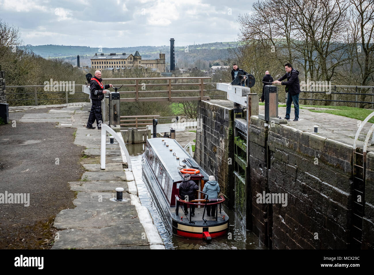 A boat being lowered down The Five Rise Locks on the Leeds and ...