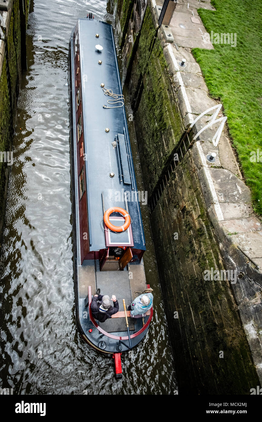 A boat being lowered down the Five Rise Locks on the Leeds and ...