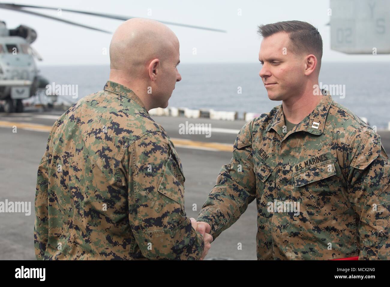 U.S. Marine Corps Col. Farrell J. Sullivan, left, commanding officer of ...