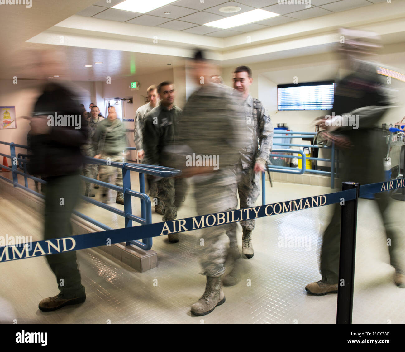 Airmen assigned to the 60th Air Mobility Wing arrive at the passenger ...