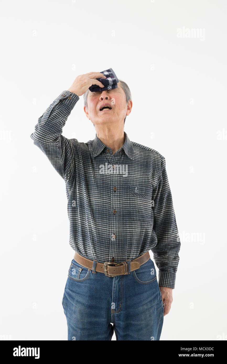 Elderly man wipe sweat hi-res stock photography and images - Alamy