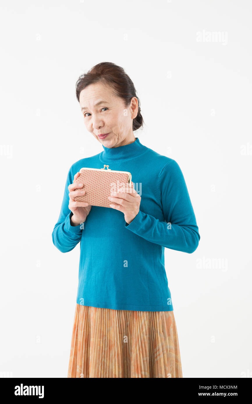 Senior woman has wallet Stock Photo - Alamy