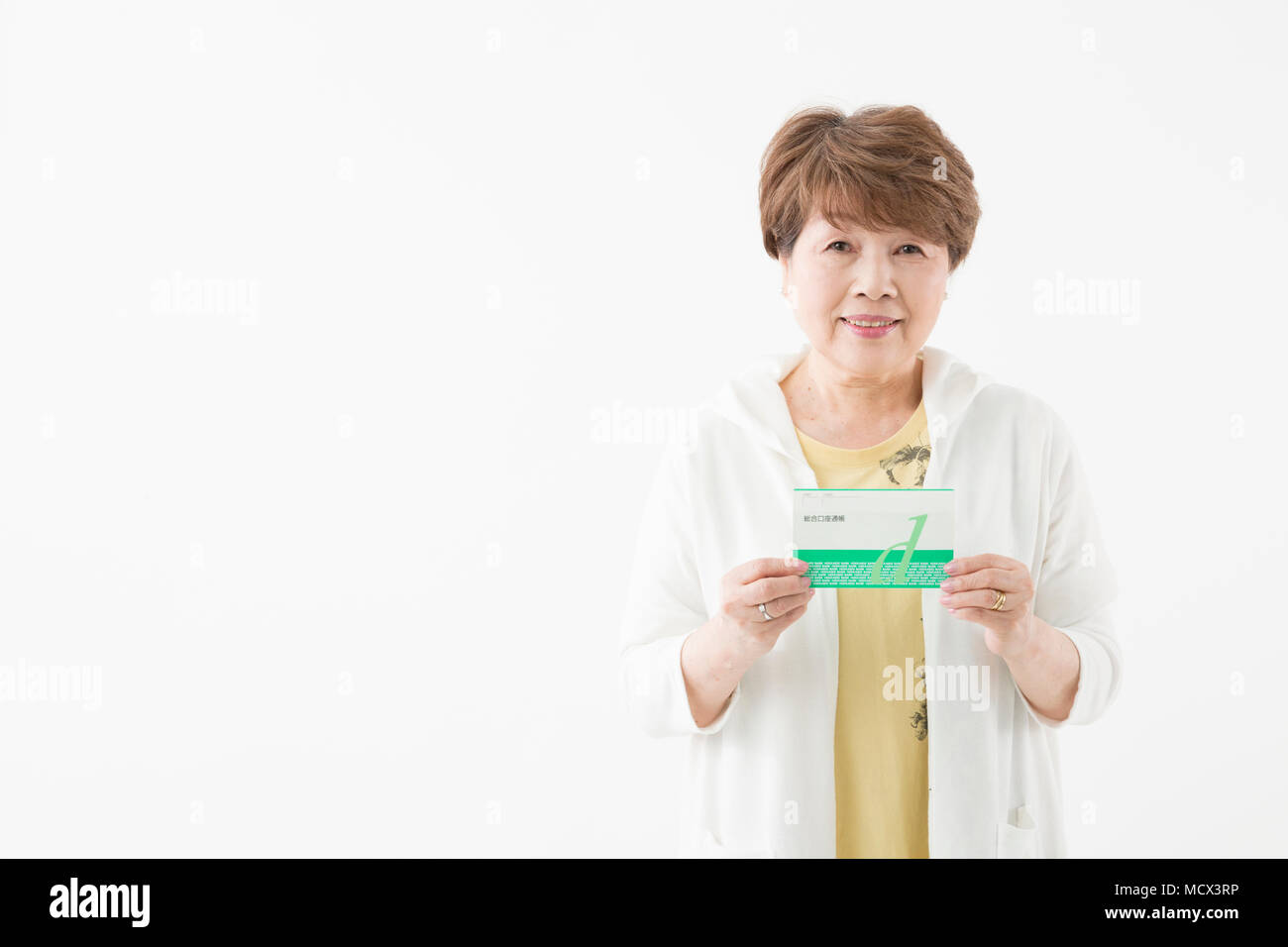 Senior woman showing passbook Stock Photo - Alamy