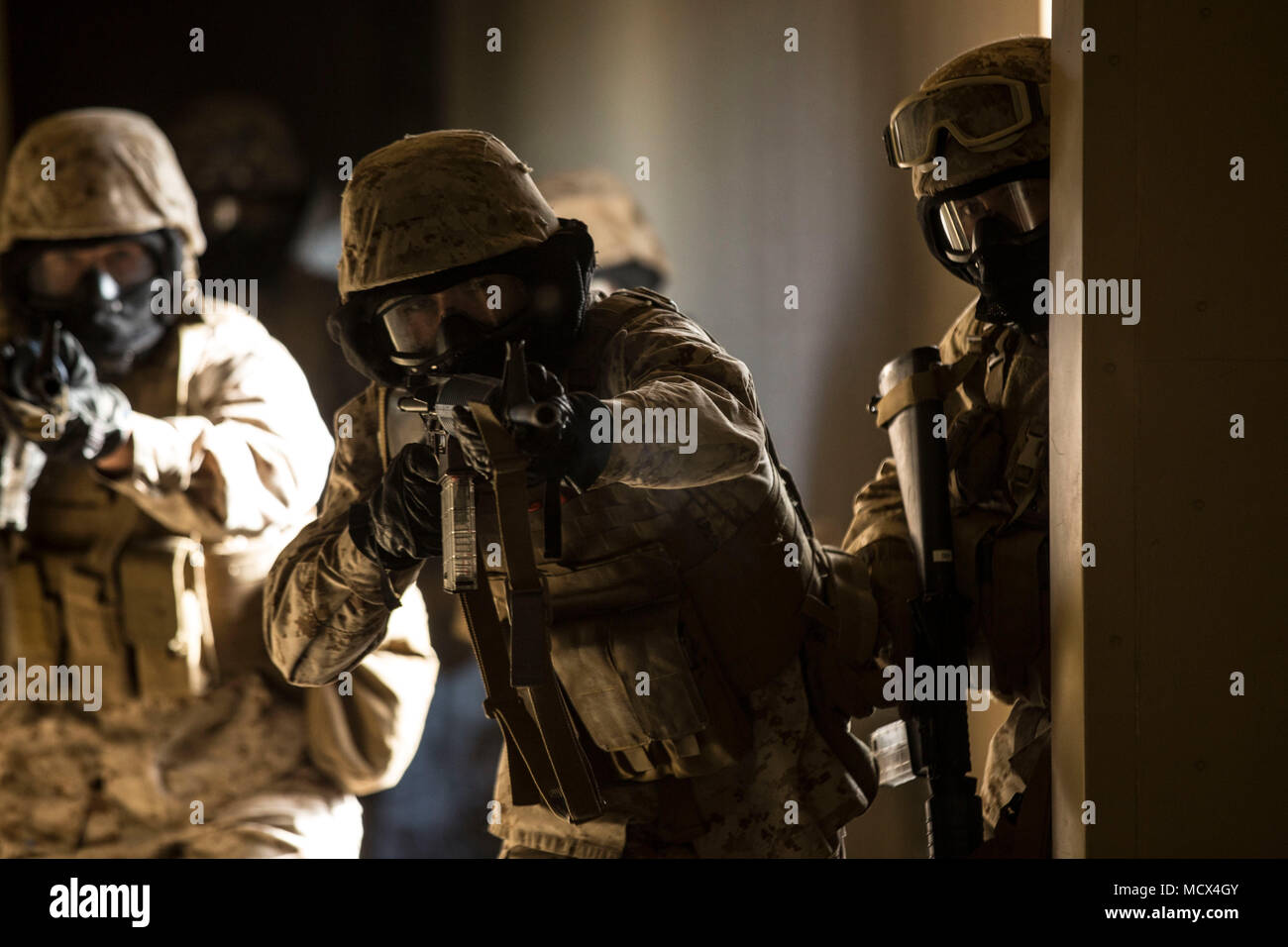 U.S. Marines with II Marine Expeditionary Force Information Group clear ...