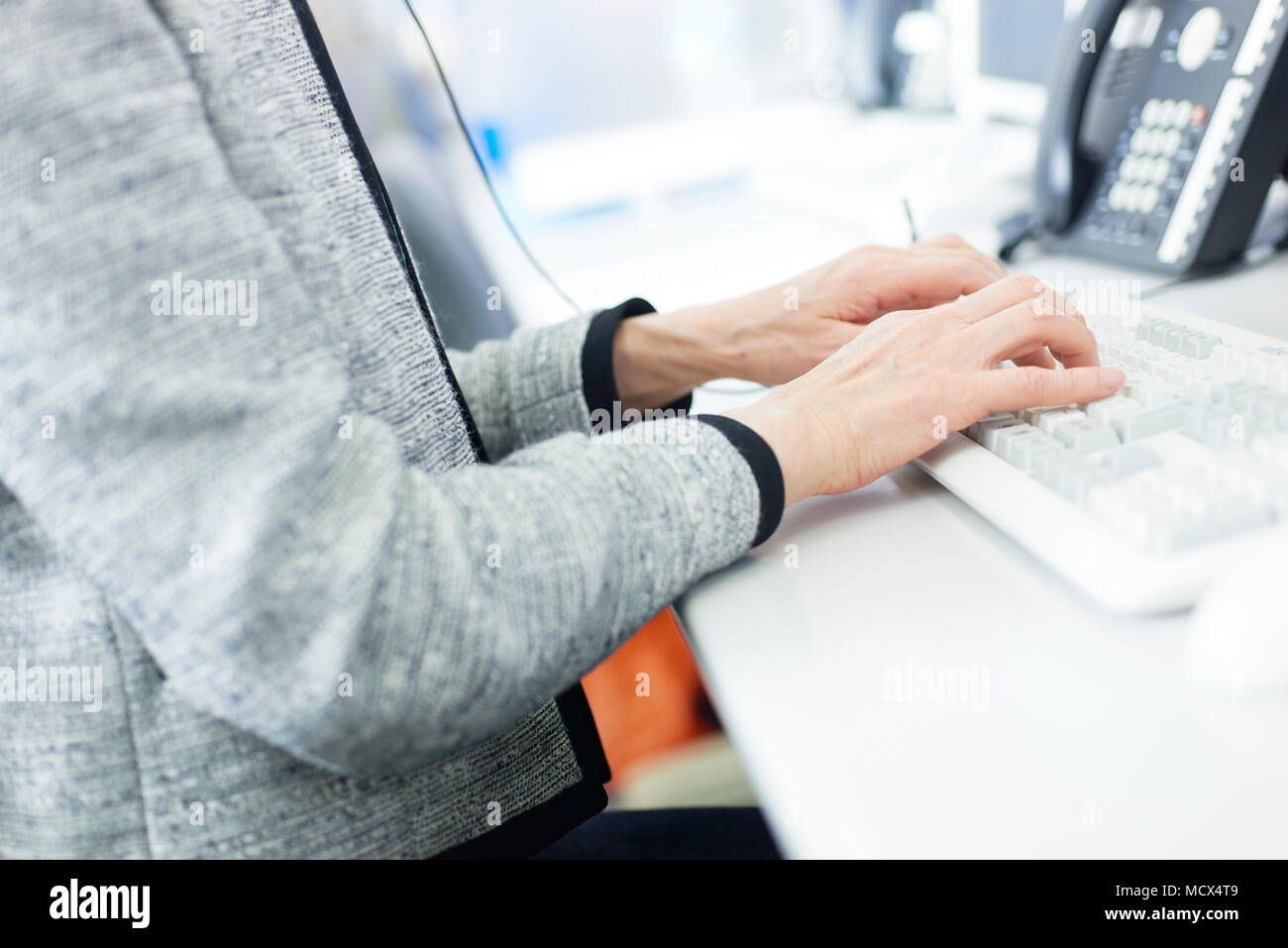 Hands typing keyboard Stock Photo - Alamy