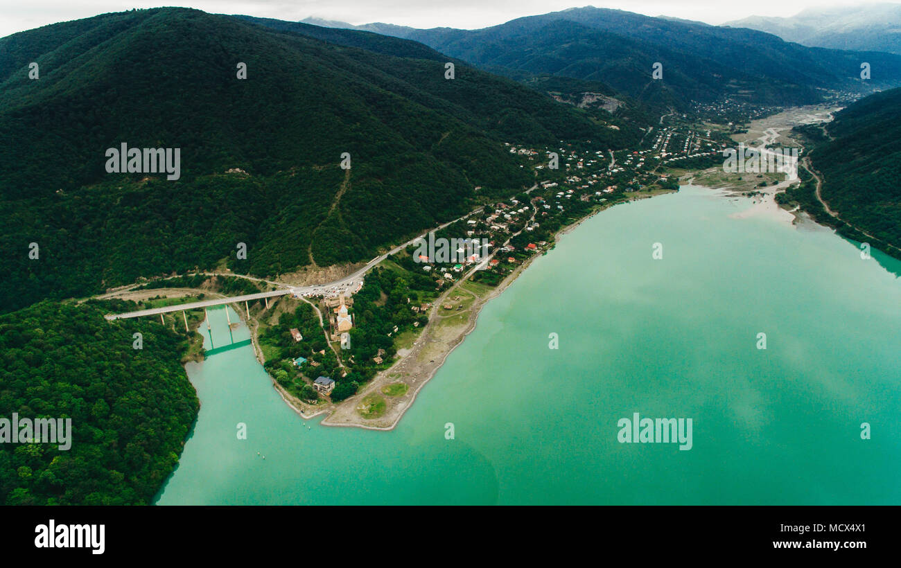 aerial view of city in beautiful georgian mountains with river Stock ...