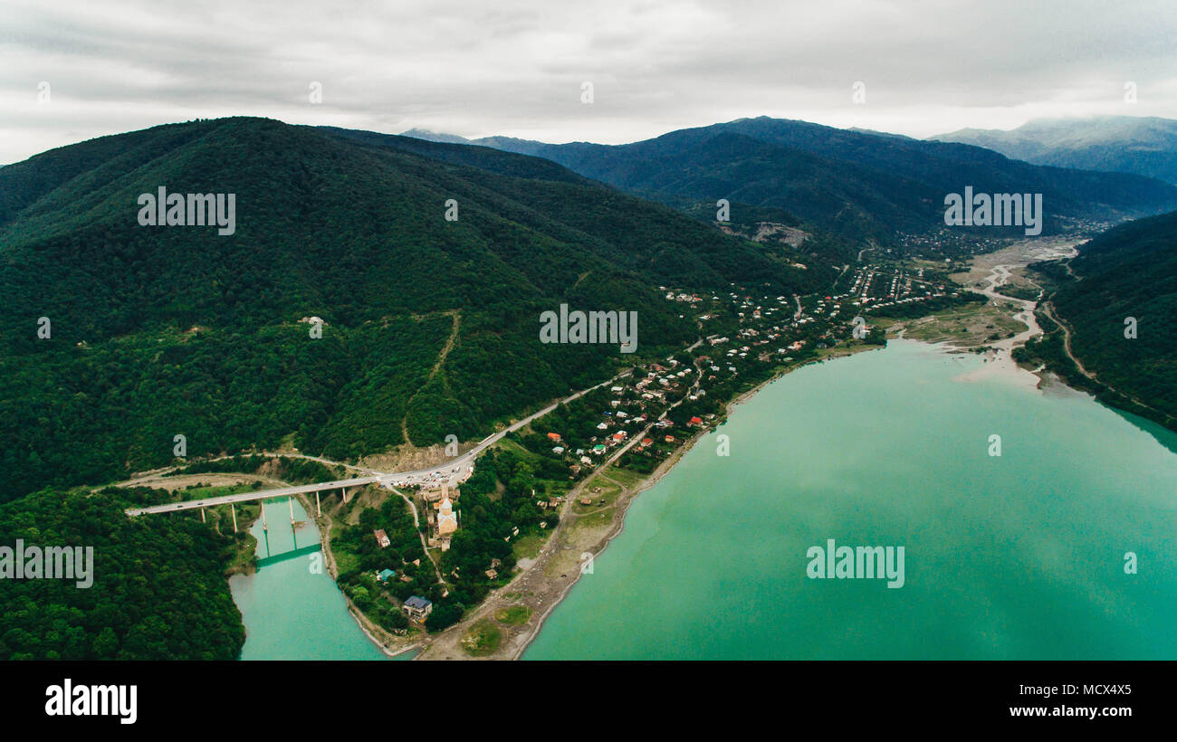 aerial view of city in beautiful georgian mountains with river Stock ...