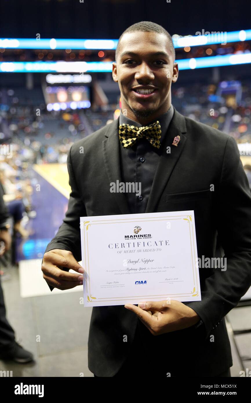 CHARLOTTE, NC – Daryl Napper poses with his certificate of merit during ...