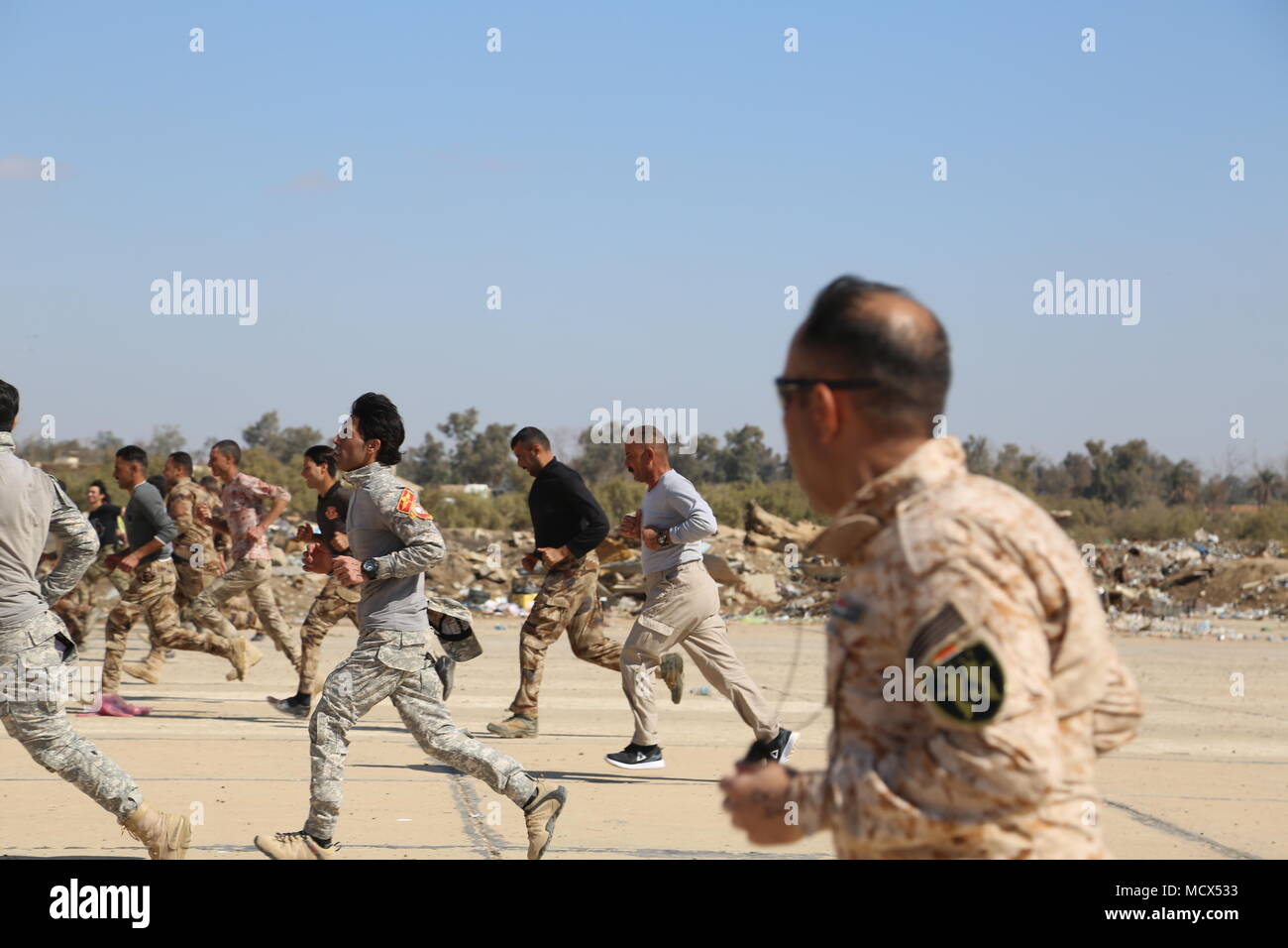 Iraqi soldiers with the Desert Battalion, Iraqi Army, race to finish ...