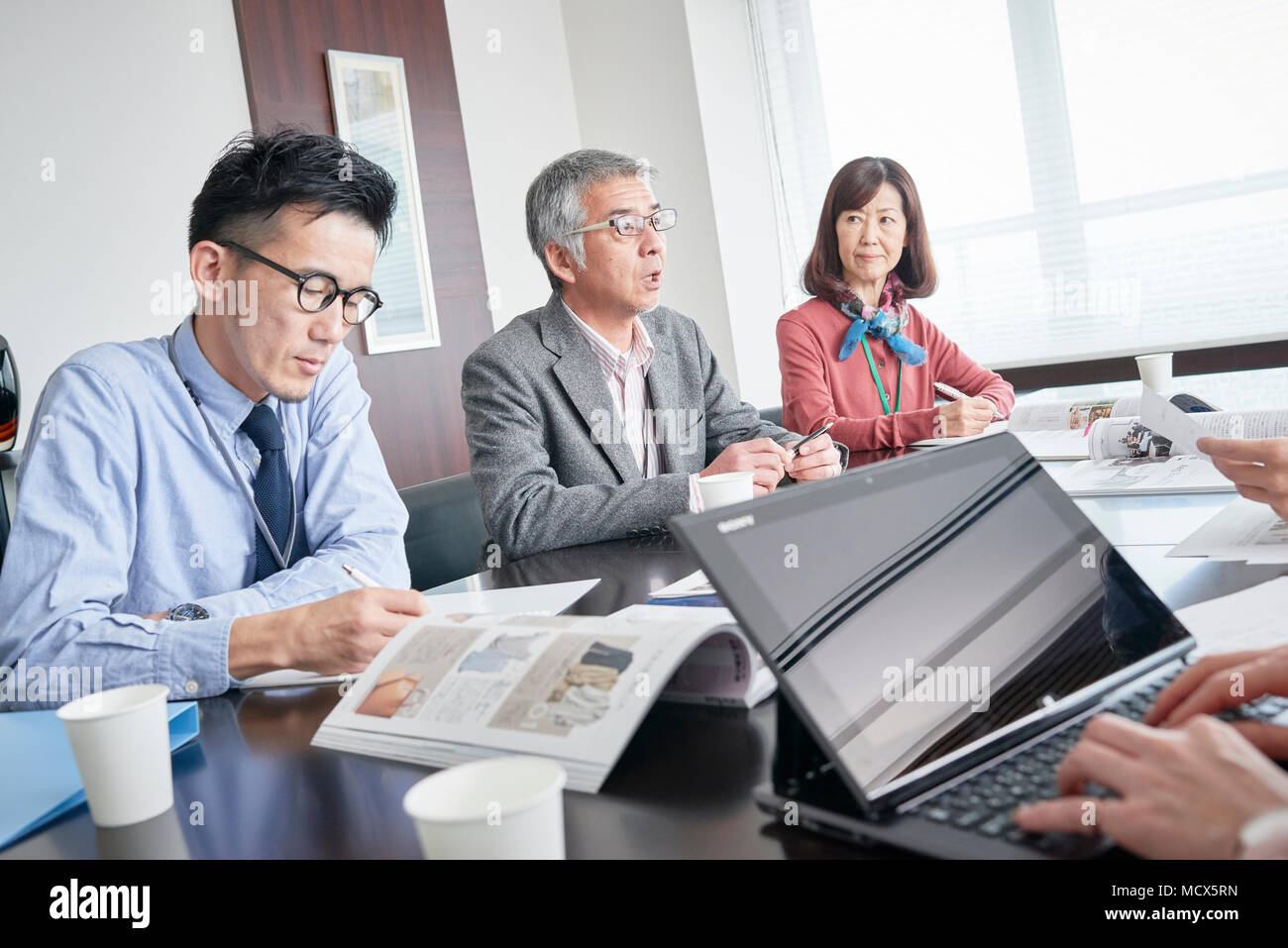 Messy conference room table hi-res stock photography and images - Alamy