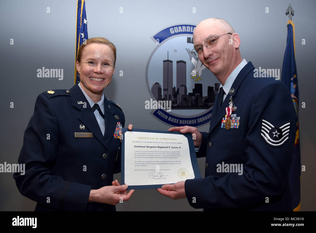 Maj. Alta R. Caputo, the commander of the105th Base Defense Squadron ...