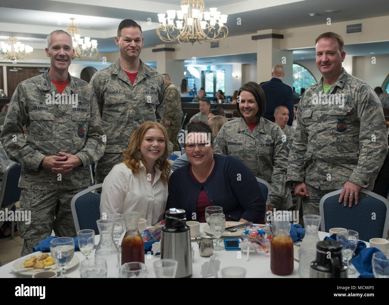 Members from the 18th Civil Engineer Group take a photo with their Key ...