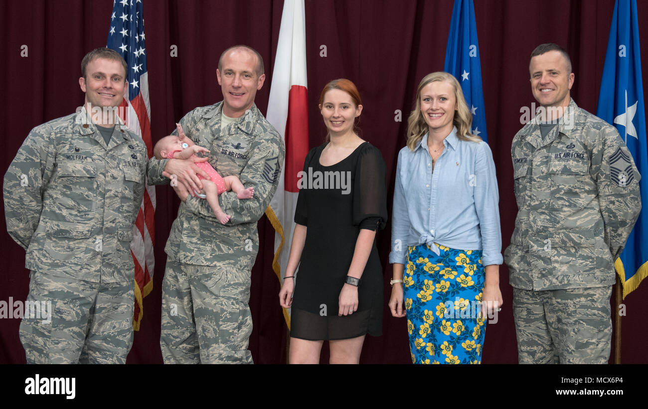 Attendees listen to an announcement during a Key Spouse appreciation ...