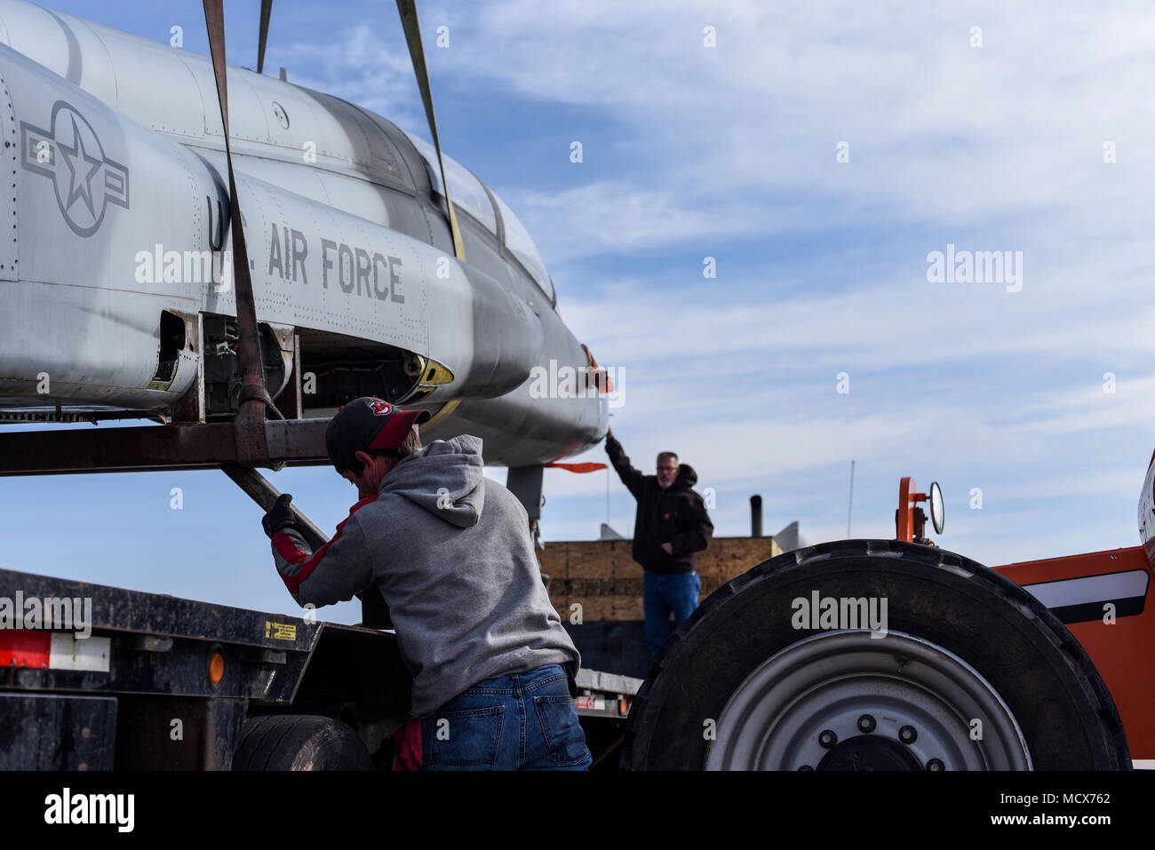 Aaron Patsch, in front, an employee at Whisler Aviation based in Seward ...