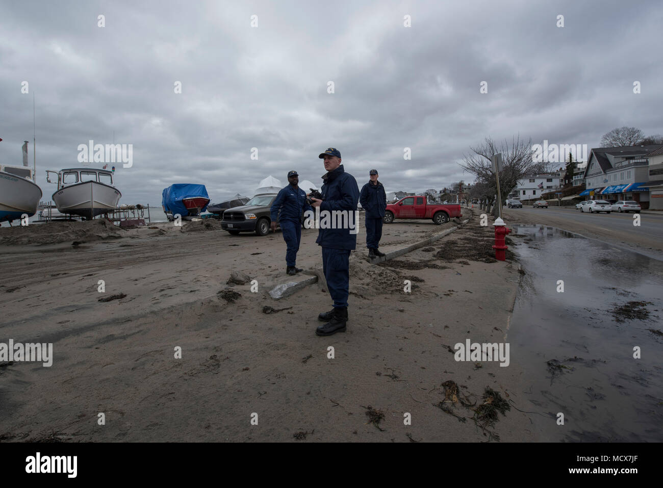 Coast Guard Sector Boston Response Petty Officers evaluate damage to ...