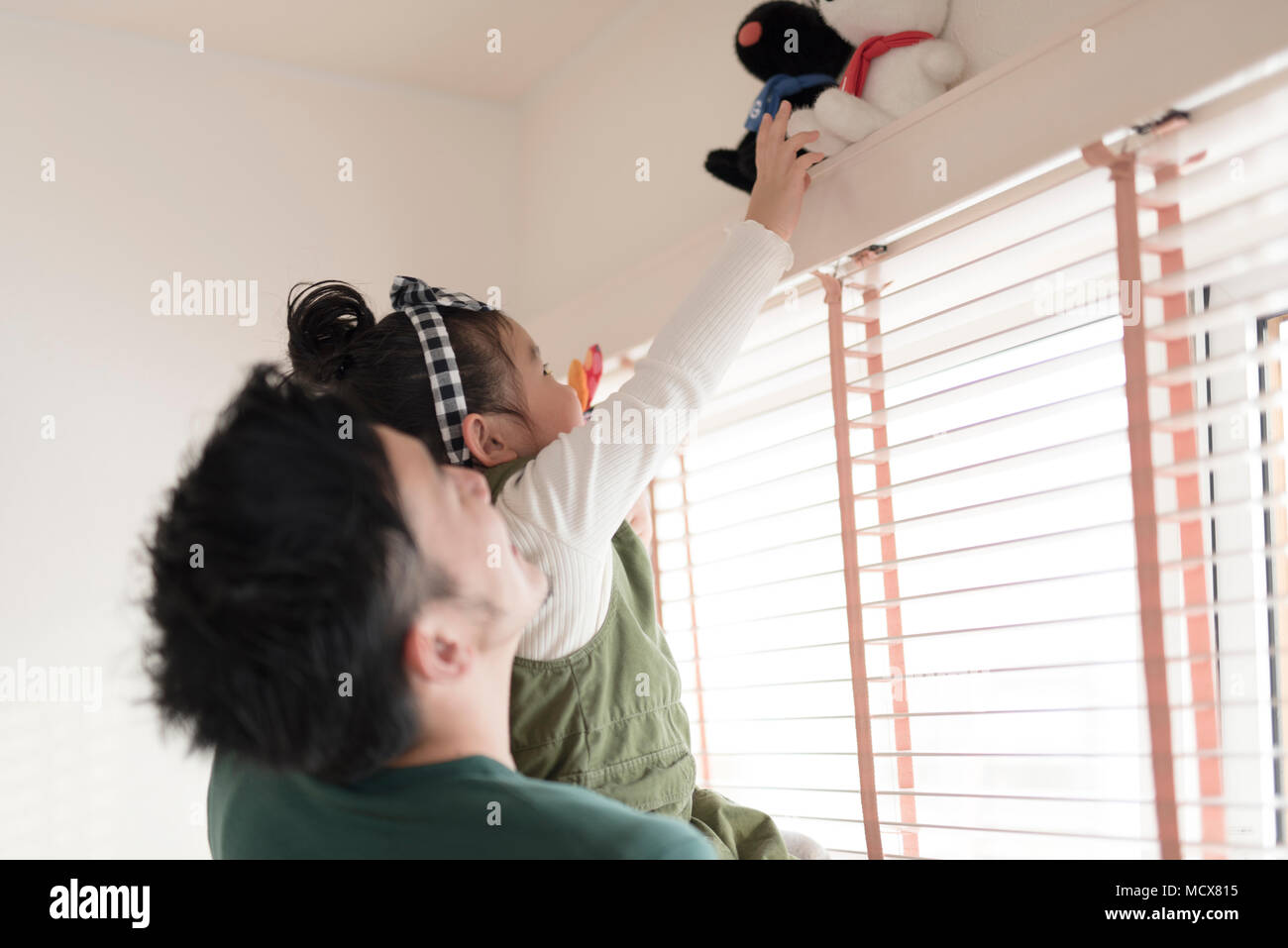 Image of parents and child Stock Photo - Alamy