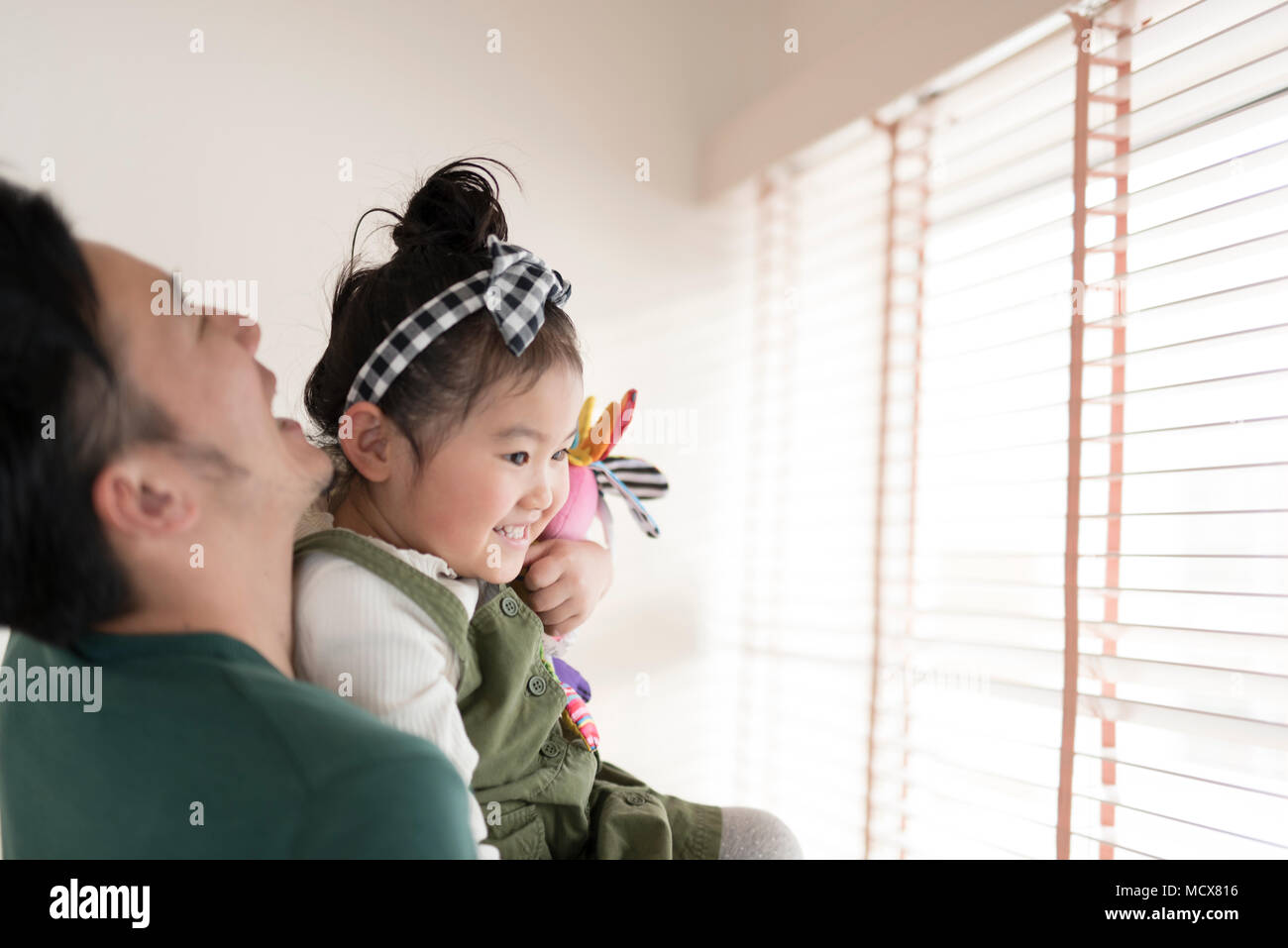 Image of parents and child Stock Photo - Alamy