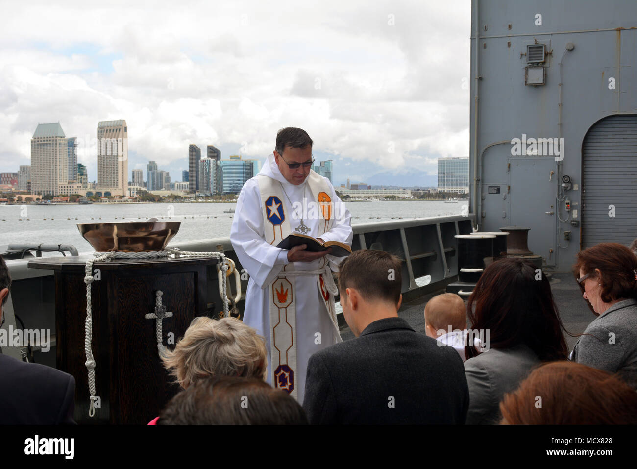 Navy chaplain, Cmdr. Jeffery Plummer, officiates a traditional Navy ...