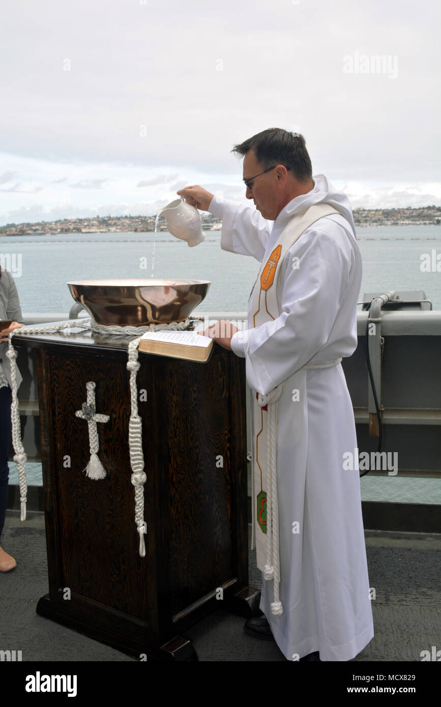 Navy chaplain, Cmdr. Jeffery Plummer, officiates a traditional Navy ...