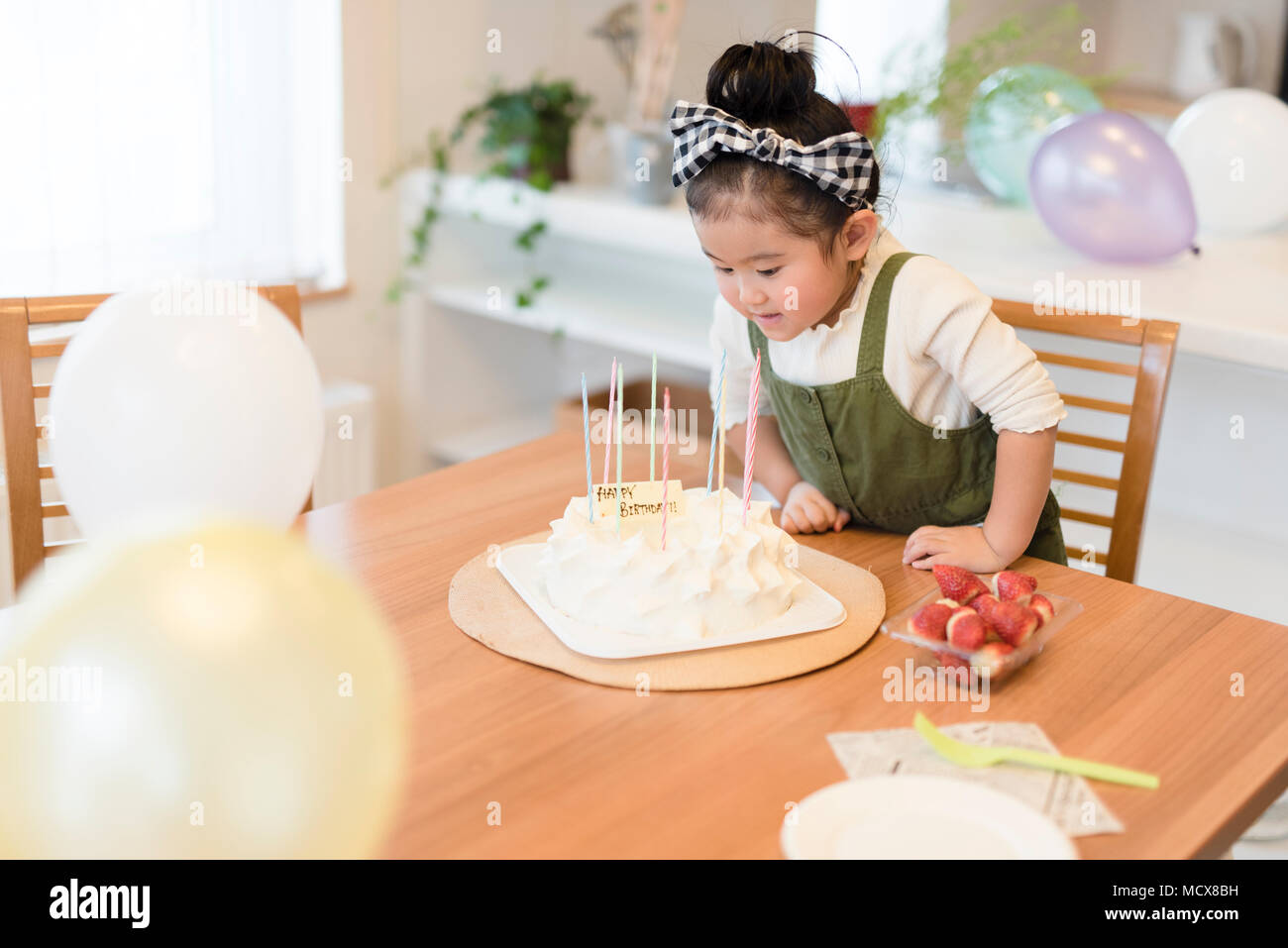 Girl making a cake Stock Photo - Alamy