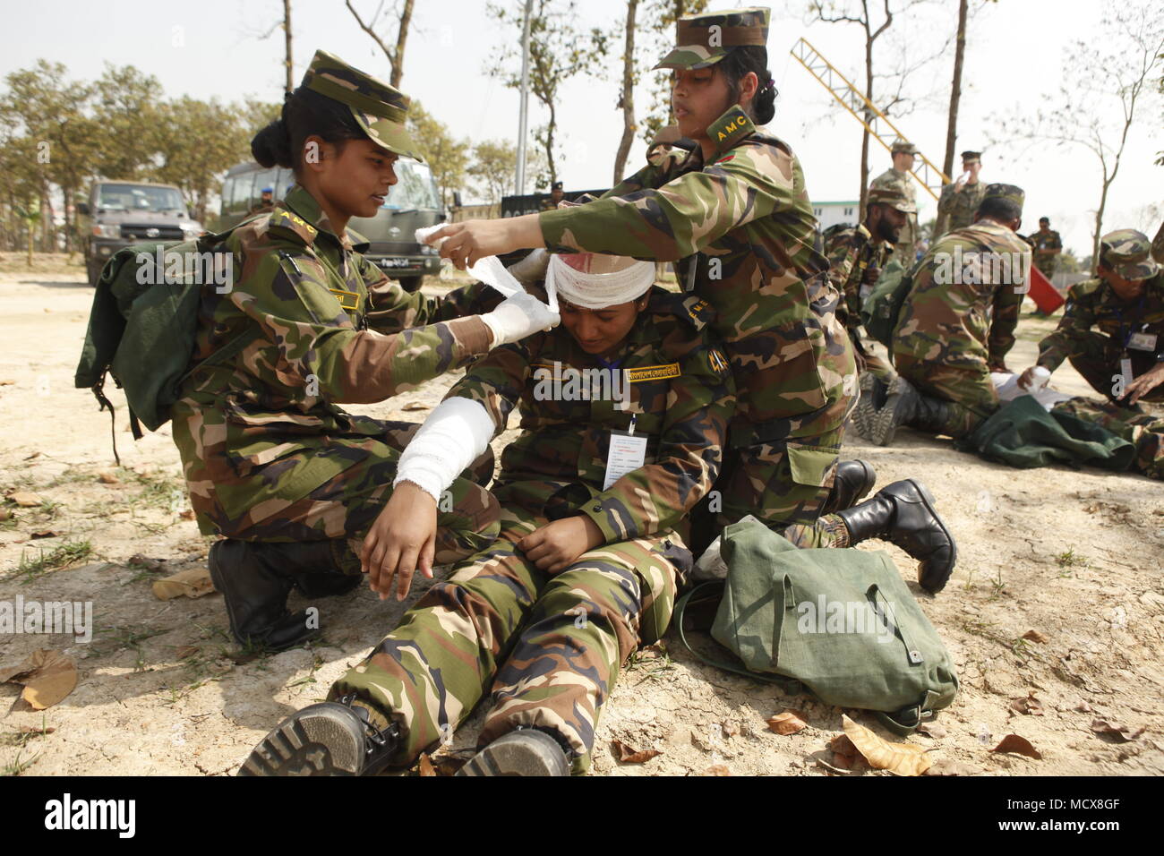 Bangladesh Army soldiers practice giving medical aid to role-players ...