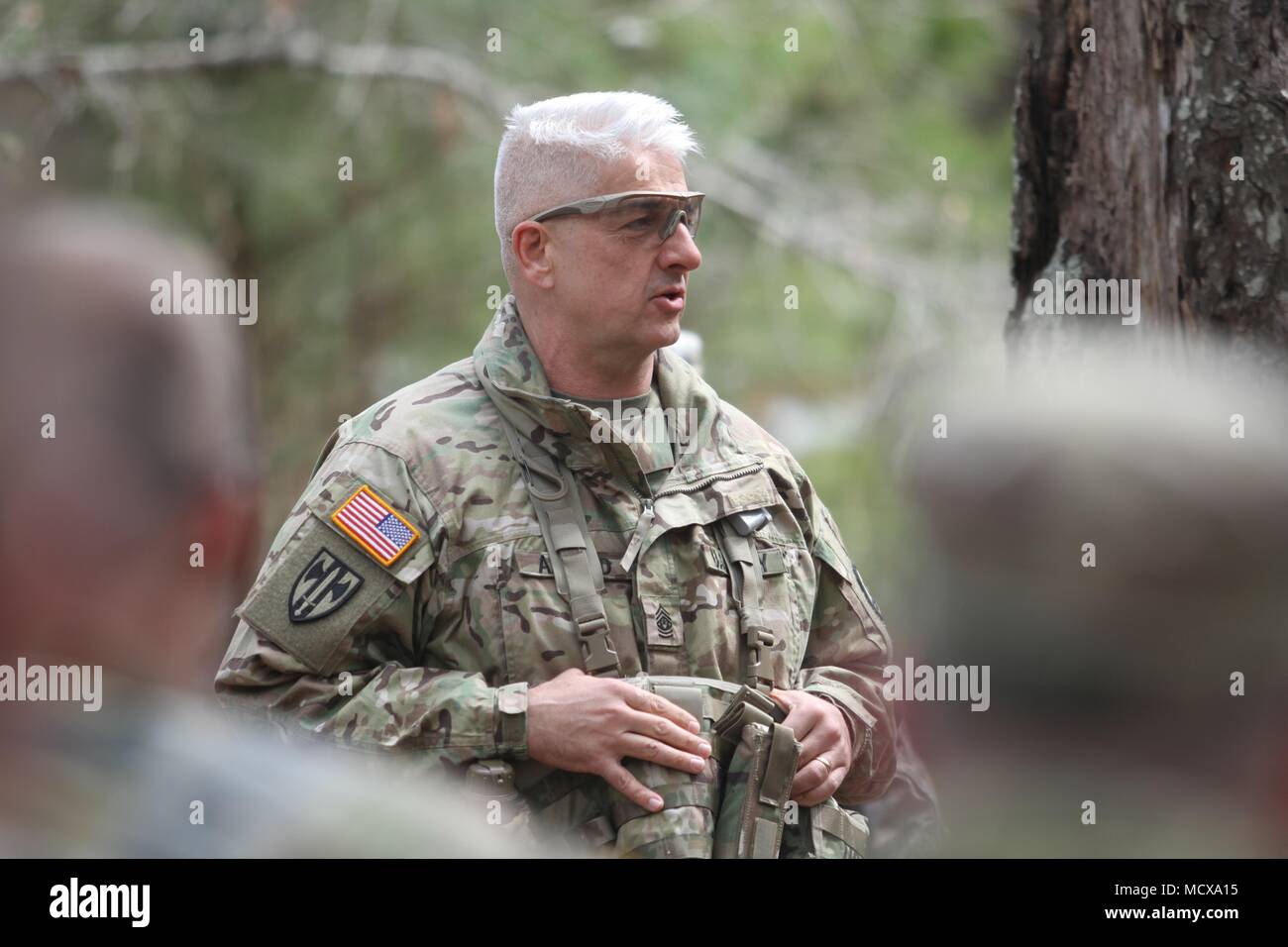 Command Sgt. Major Lawrence Arnold, 84th Training Command, stops by to speak with Soldiers part ...