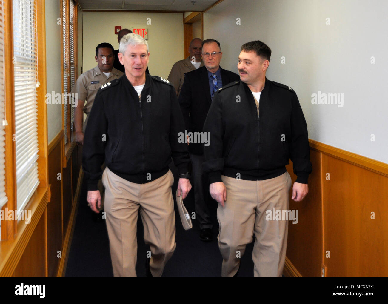Commander of Naval Sea Systems Command, Vice Adm. Thomas Moore (left ...