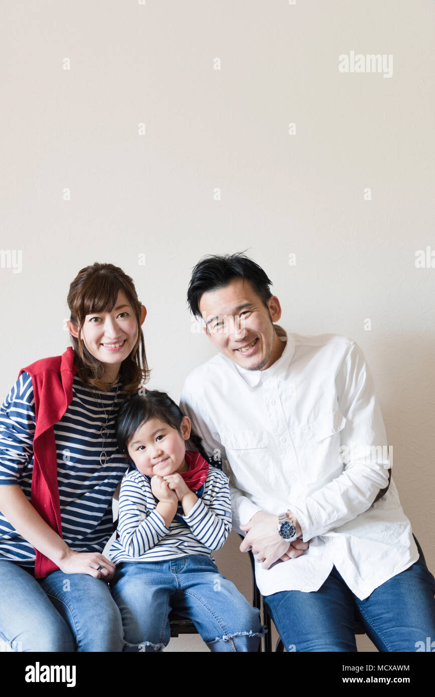 Portrait of three member of family Stock Photo - Alamy