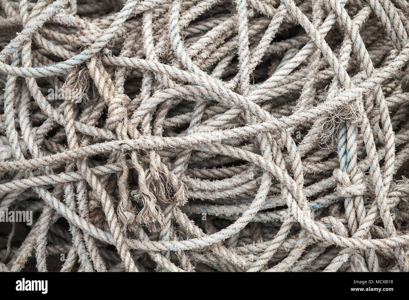 Gray sea ropes lie in a heap in fishing port of Busan Stock Photo - Alamy