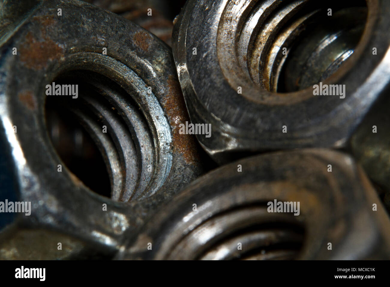 Rusty nuts close-up picture Stock Photo - Alamy