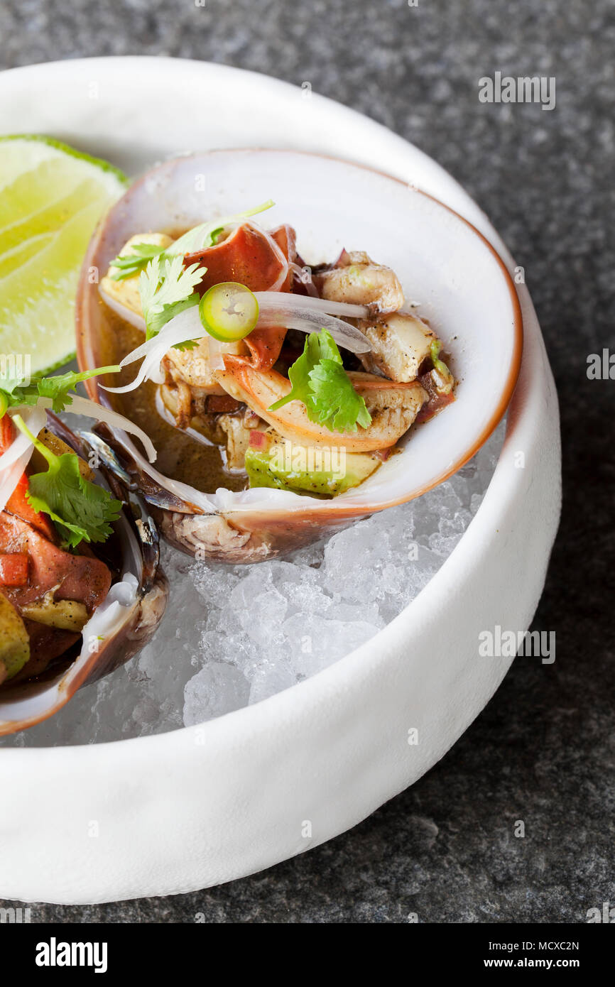 Chocolate clams with black garlic aguachile from Manta Los Cabos, Baja ...