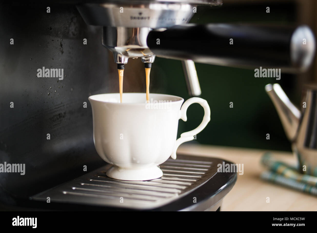 Closeup shot hand pouring coffee hi-res stock photography and images ...