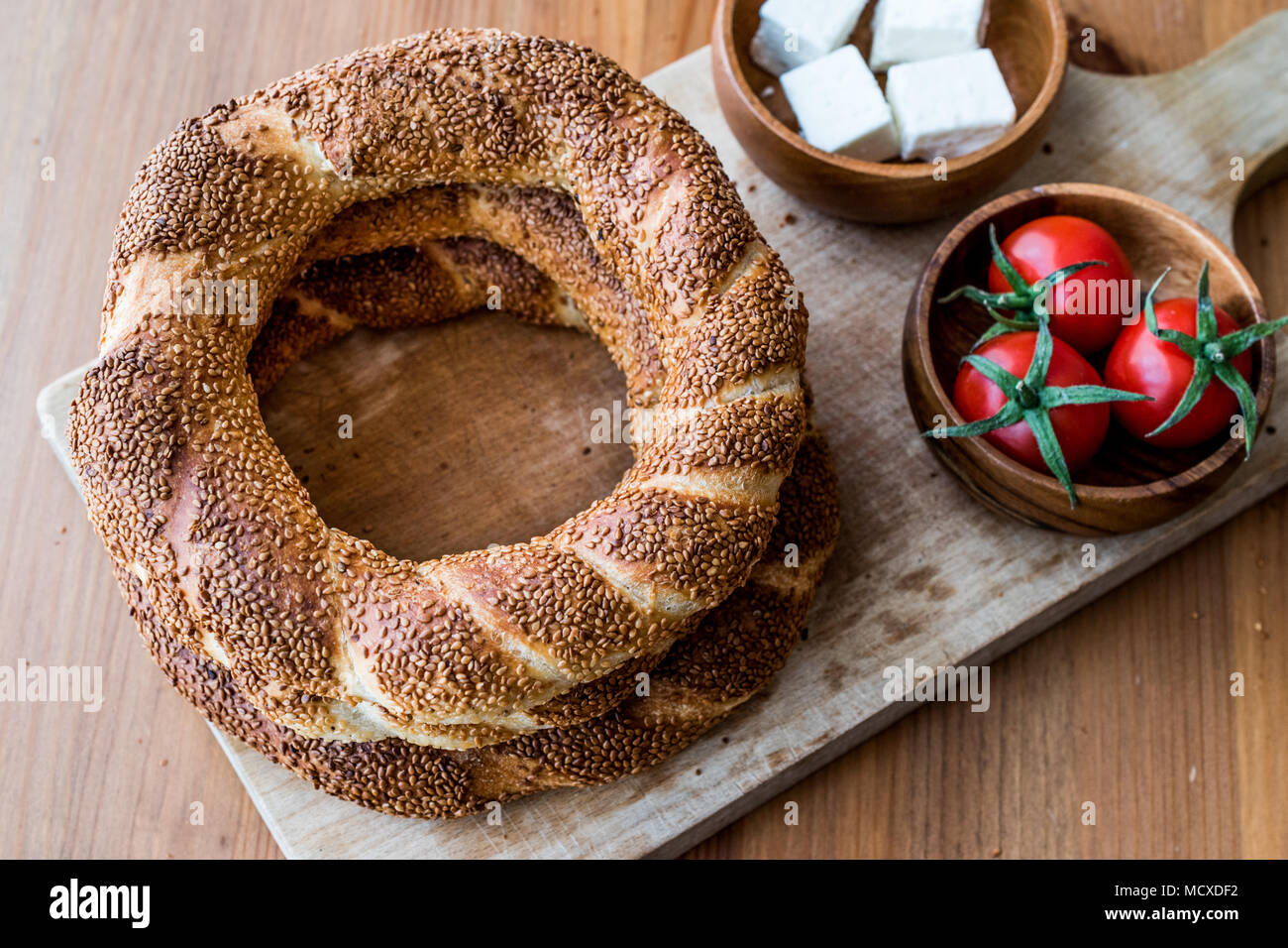 Turkish Bagel Simit with cheese and cherry tomatoes (ramadan concept ...