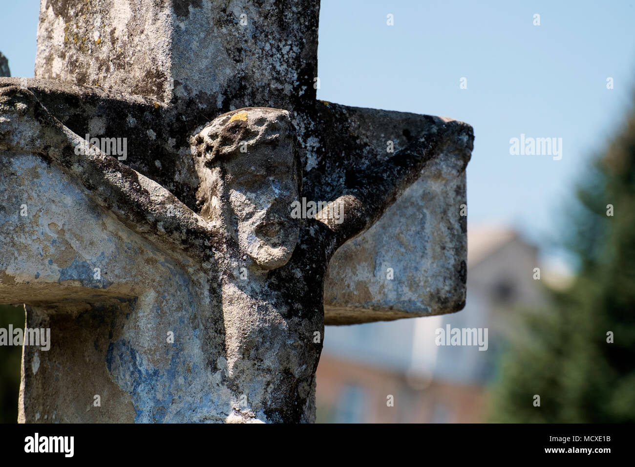 Ancient stone cross with a crucifix Stock Photo - Alamy