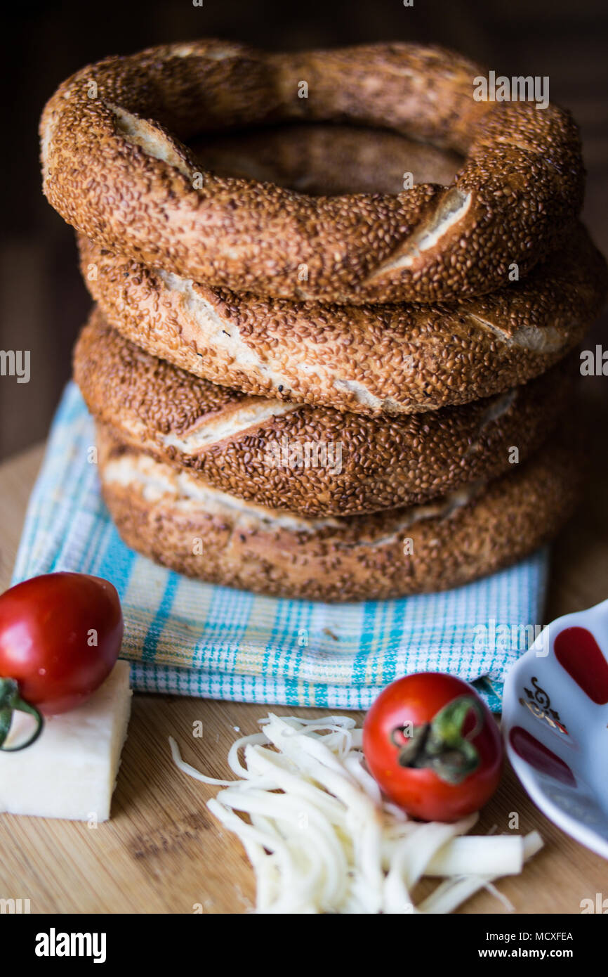 turkish bagel simit with tea, cheese and cherry tomatoes Stock Photo ...