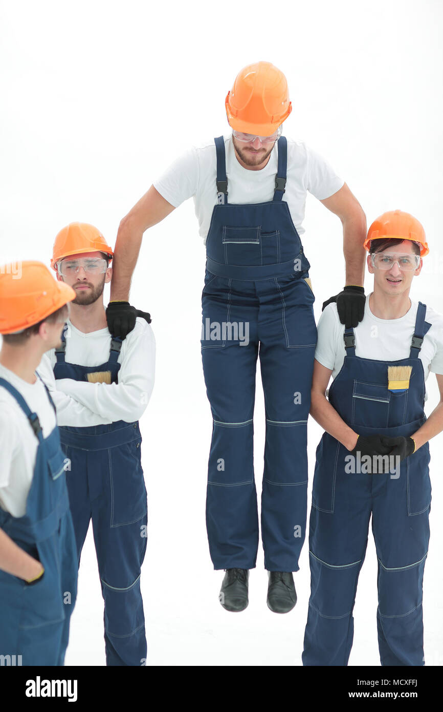construction worker sitting on the shoulders of colleagues Stock Photo ...
