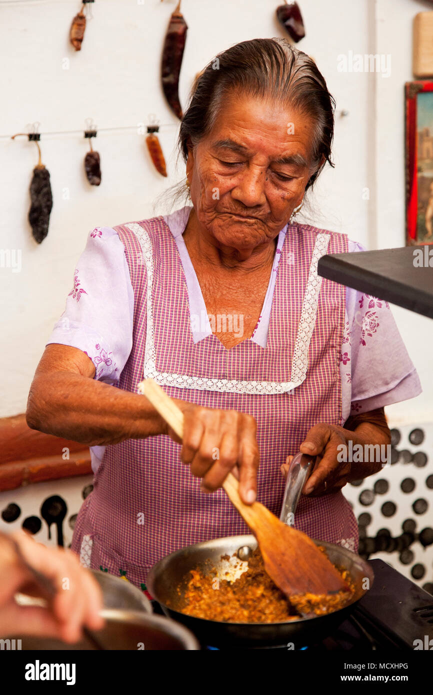 Grandmother of Chef José Luis Diaz cooking enchiladas de san pedro ...