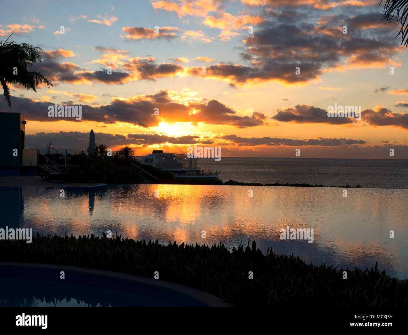 Spectacular sunrise over the harbour in Funchal Madeira Portugal. On a ...
