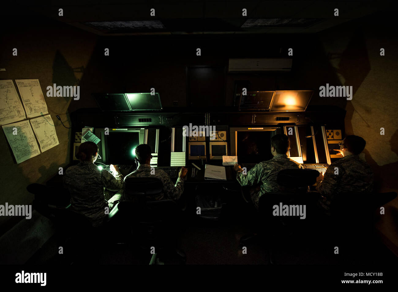 Air traffic controllers train on simulators in the Radar Approach ...