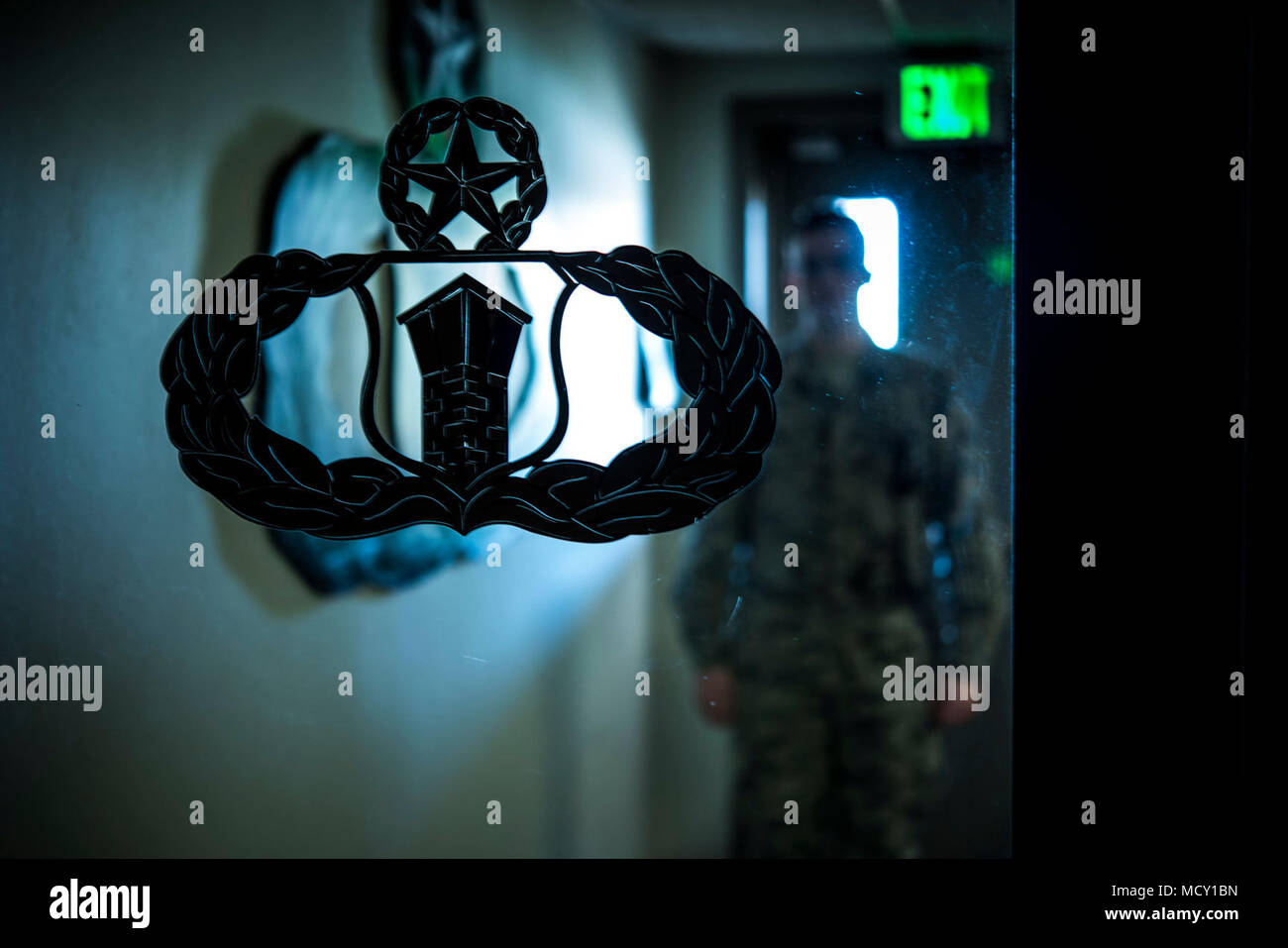 An air traffic controller walks into the Radar Approach Control(RAPCON ...