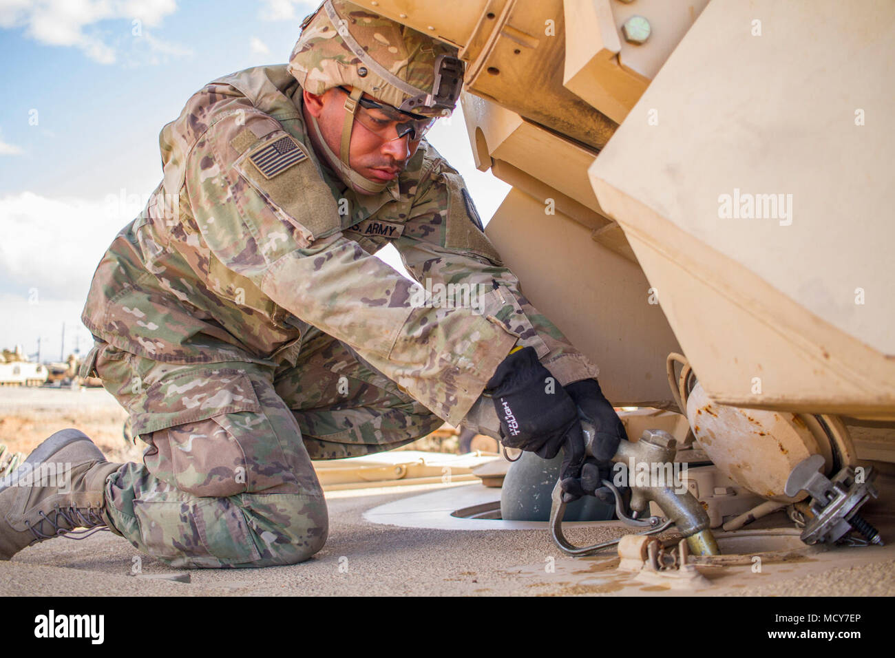 U.S. Army Sgt. Kevius D. Willis, an armor crew member assigned to Troop ...