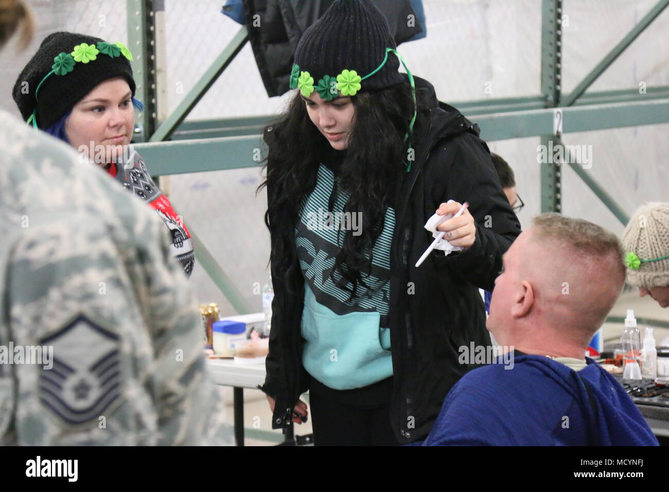 Brittany Dickinson, a casualty collection point volunteer, puts makeup ...