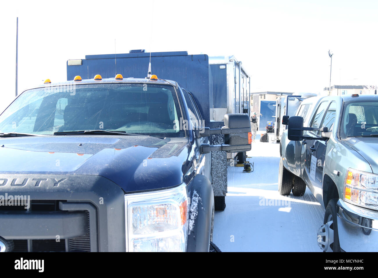 Civil Support Team vehicles are parked outside of a training event at ...