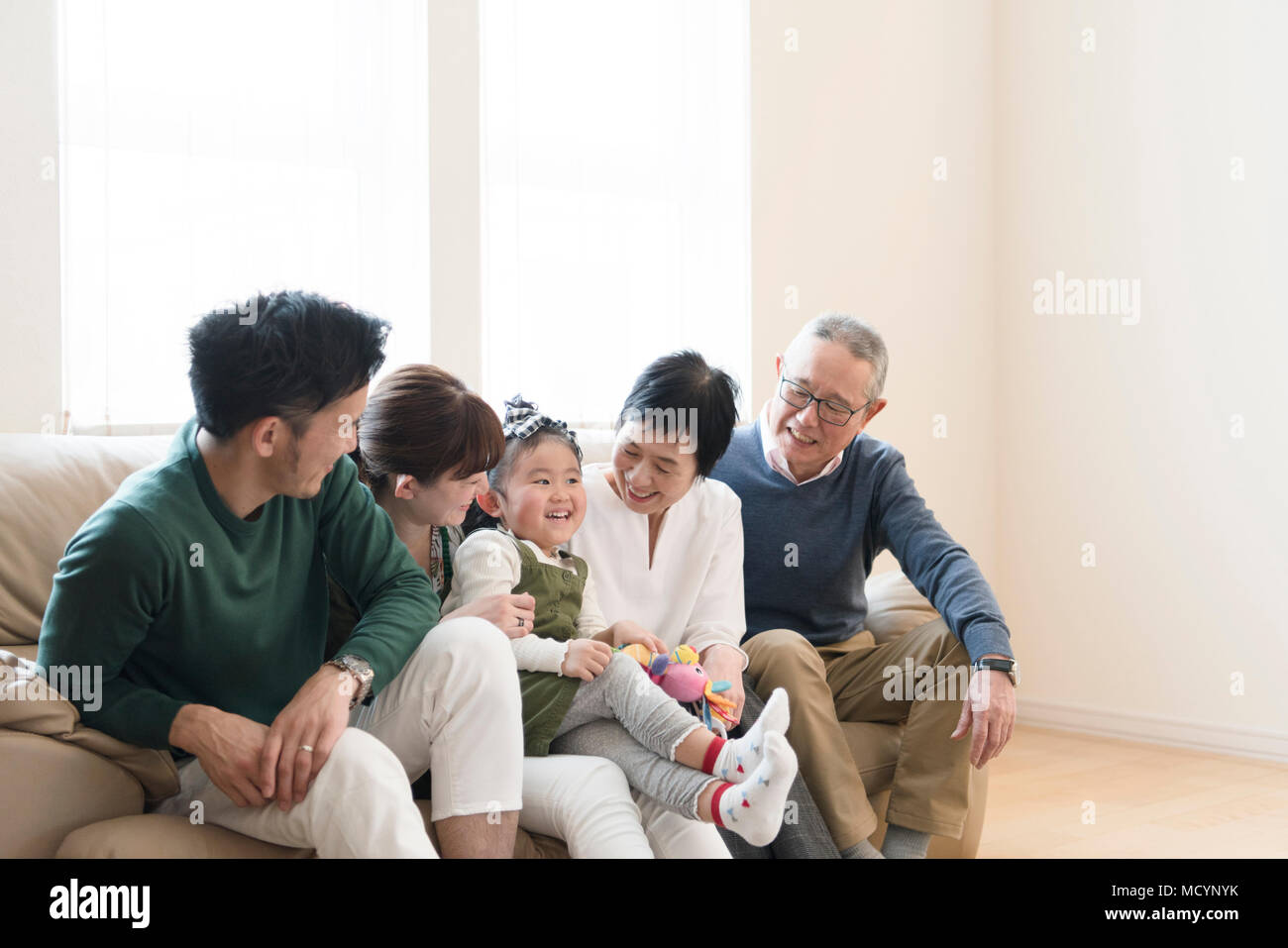 Generations of family hi-res stock photography and images - Alamy