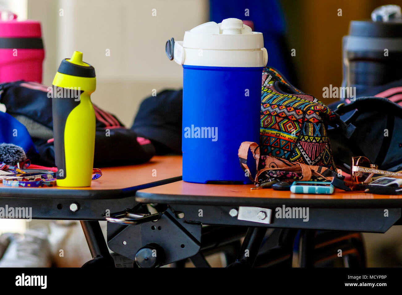 the water and other important items table at band camp Stock Photo - Alamy