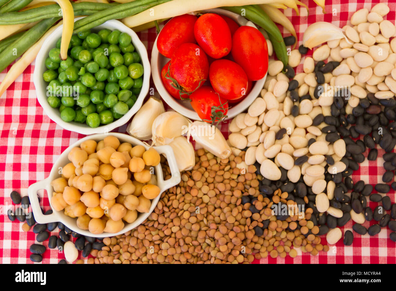 variety of kitchen ingredients with fresh and dried legumes Stock Photo ...