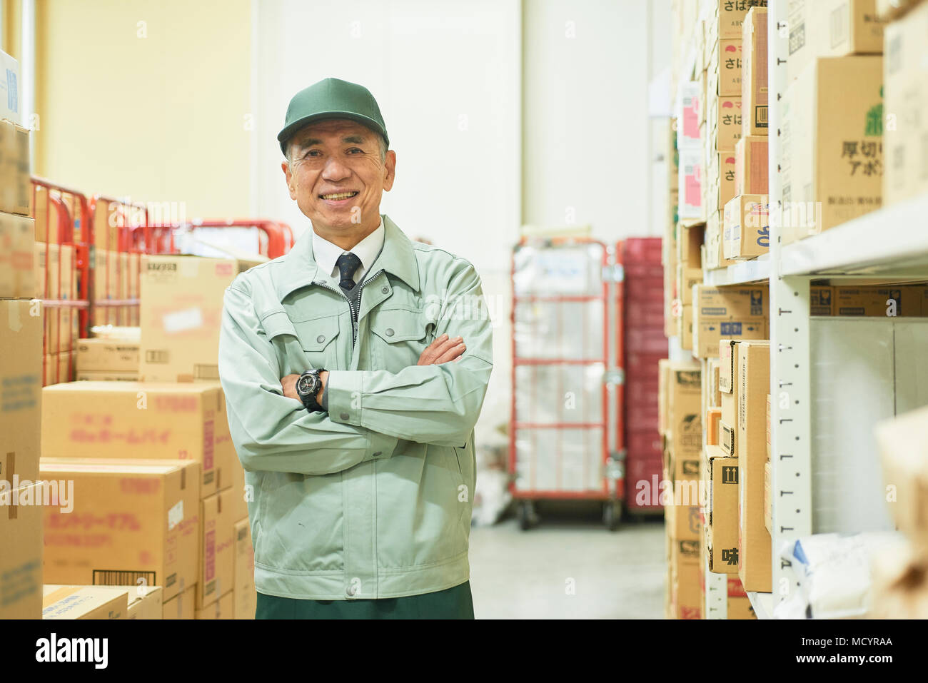 Senior man manager in supermarket (stock control Stock Photo - Alamy
