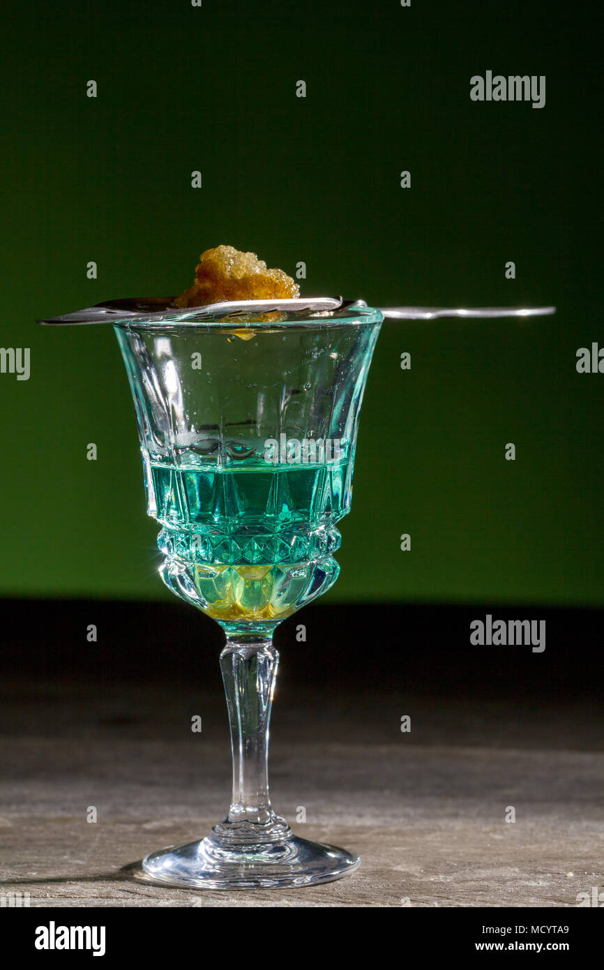 Burned sugar on spoon, traditional method served of absinthe Stock ...