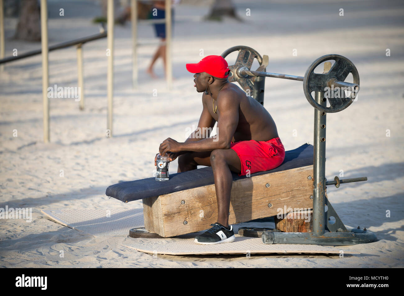 MIAMI - DECEMBER 27, 2017: Muscular young man works out at the outdoor ...