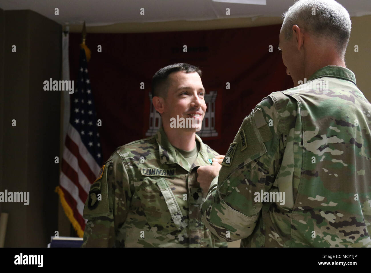 COL Jason Kirk presents LTC John Cunningham with the Army Commendation ...